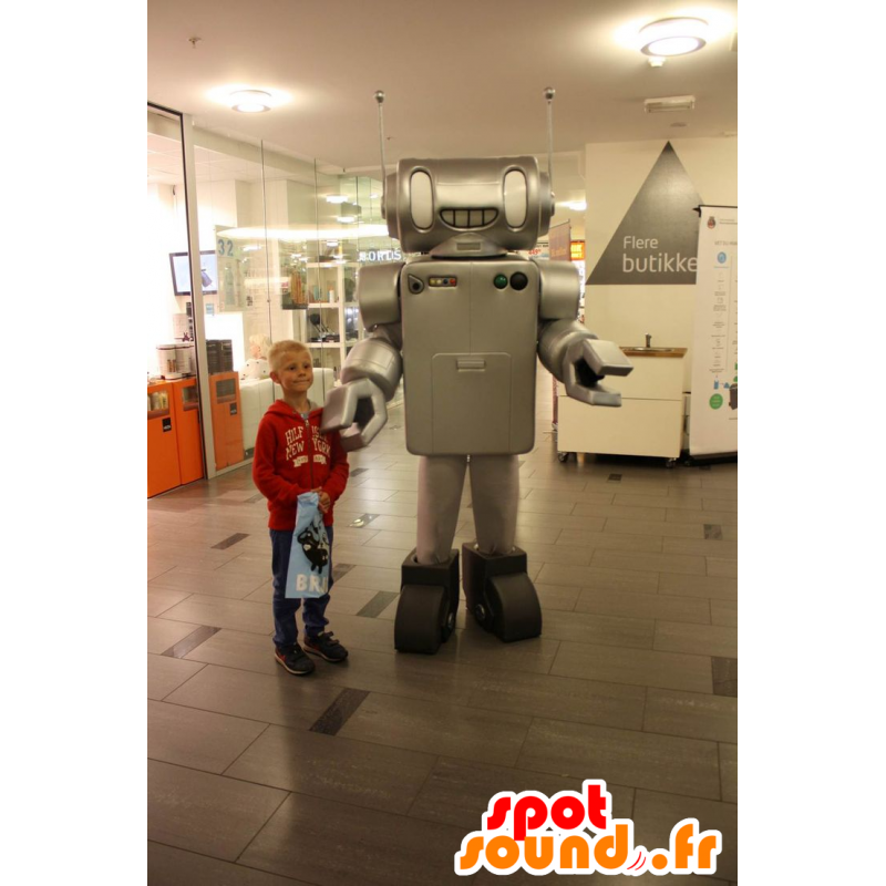 Mascotte de robot gris métallisé, très réaliste dans Mascottes de Robots